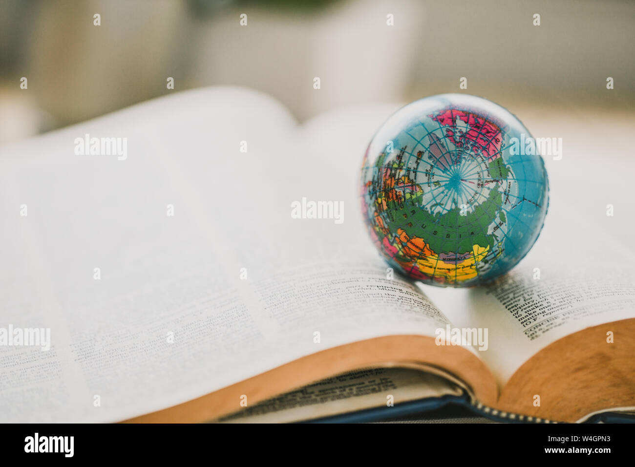 World globe on book. education school Concept Stock Photo - Alamy