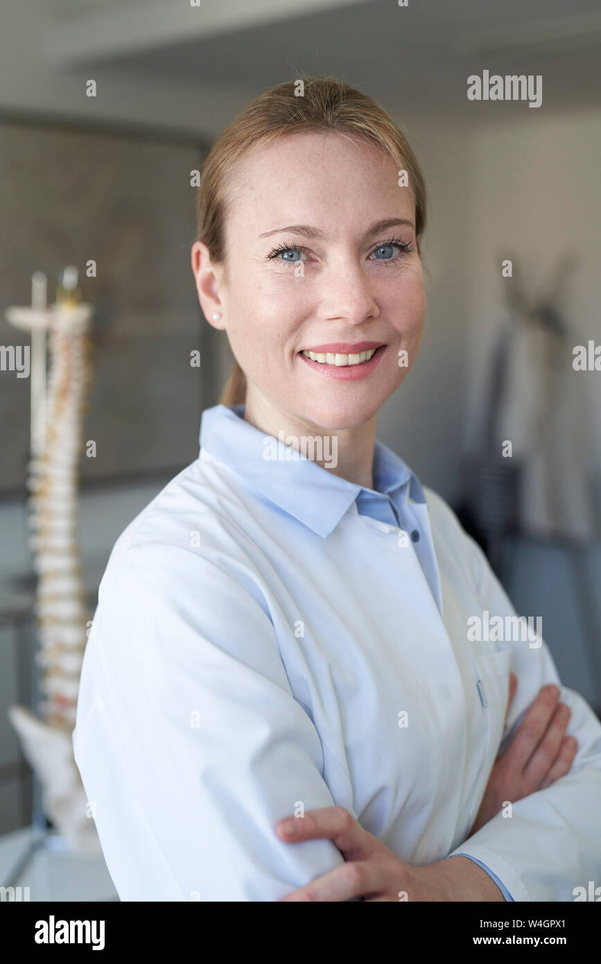 Portrait of confident female doctor in medical practice Stock Photo - Alamy