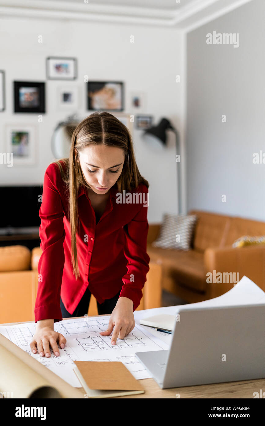 Engineer working blueprint table in hi-res stock photography and images ...
