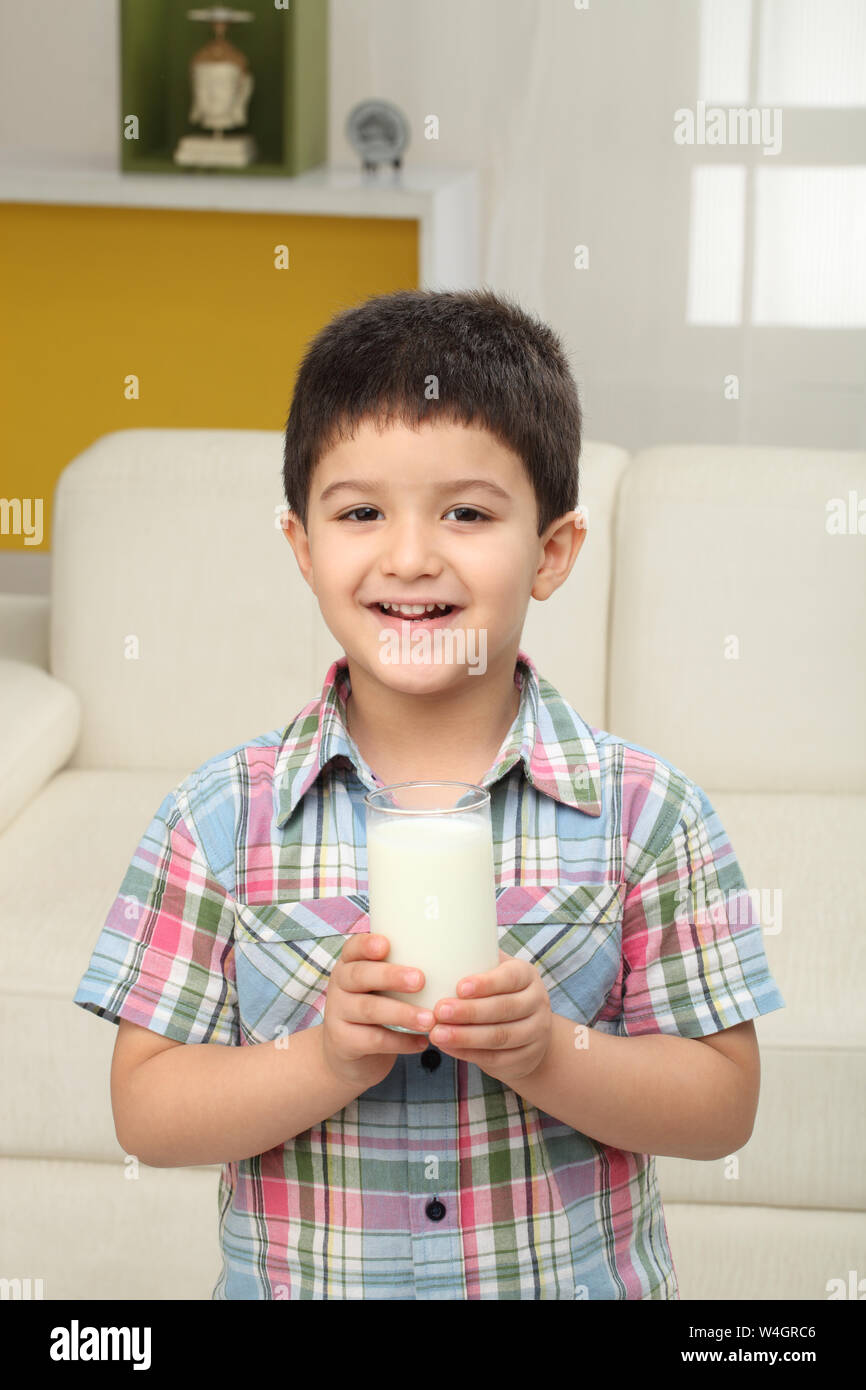 Indian boy drinking milk breakfast hi-res stock photography and images ...