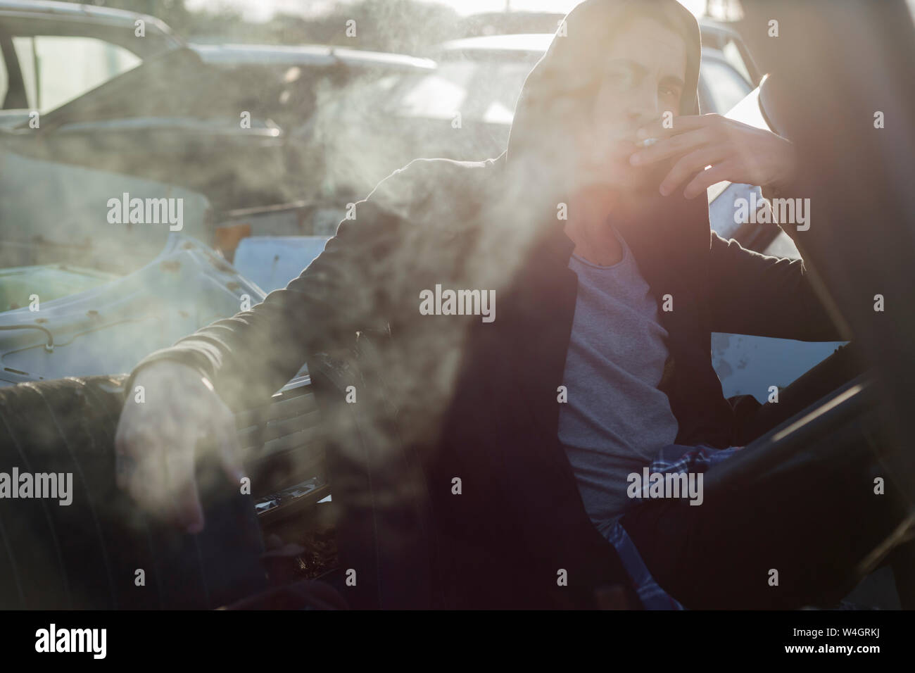 Sitting in old car in scrapyard hi-res stock photography and images - Alamy