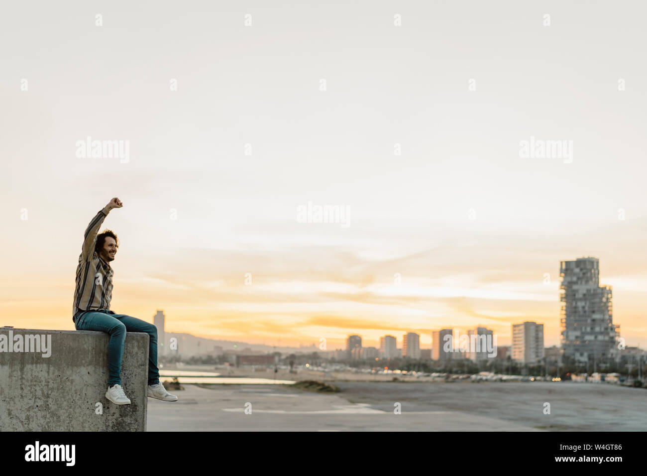Man relaxing on freedom raised hi-res stock photography and images - Alamy