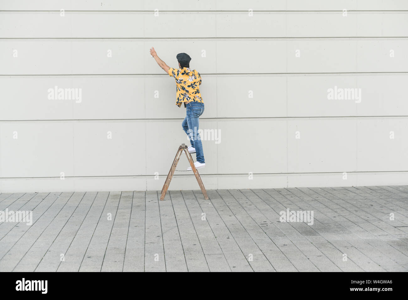Man climbing step ladder hi-res stock photography and images - Alamy