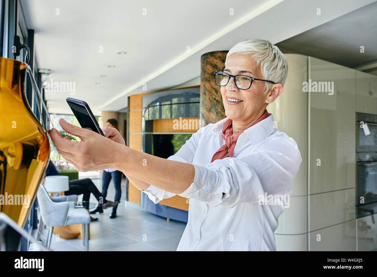 Checking a price tag hi-res stock photography and images - Alamy