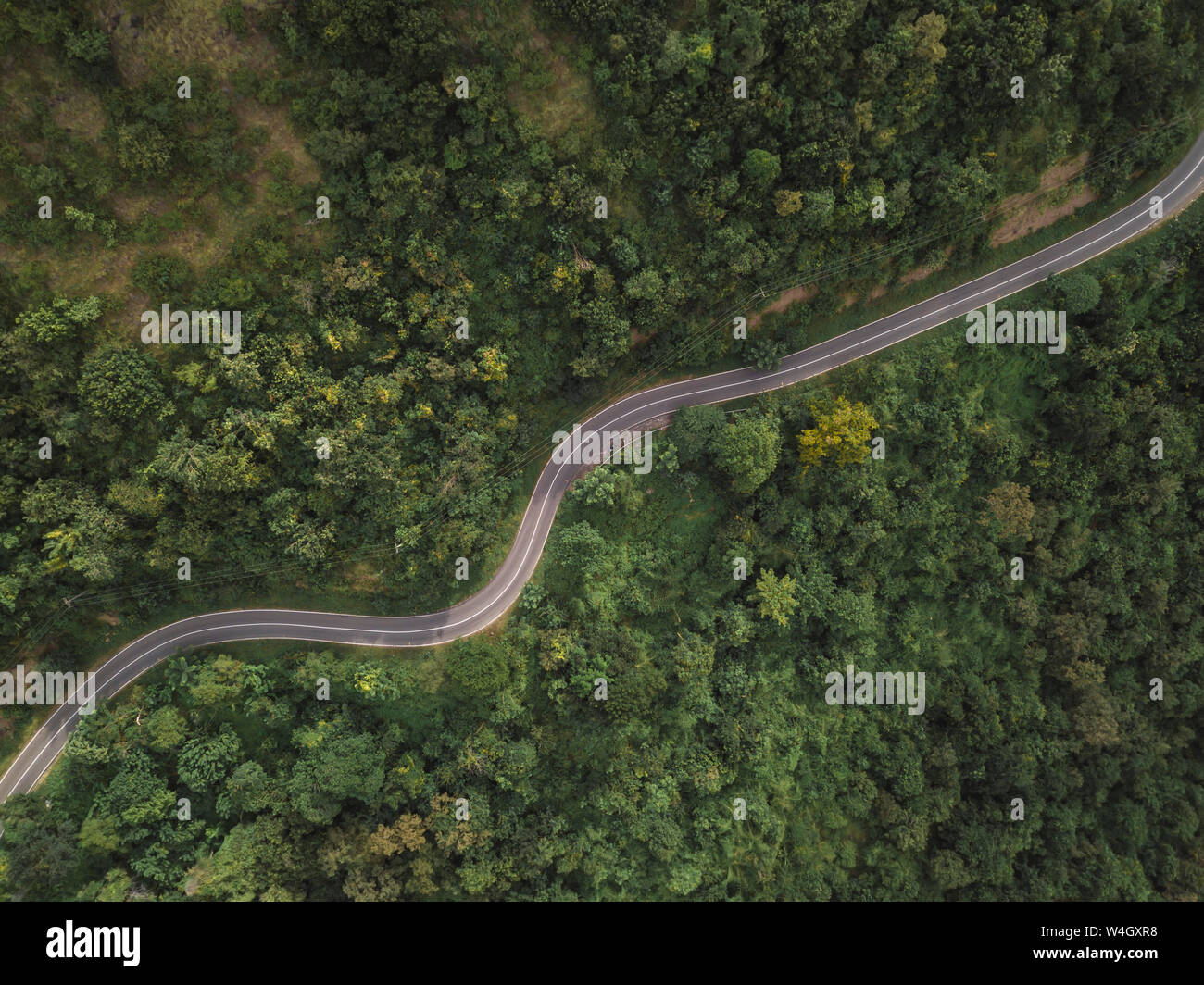 Aerial view of a road in mountains, West Sumbawa, Indonesia Stock Photo ...