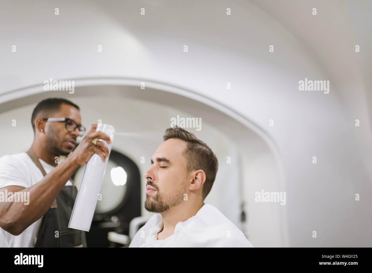 Customer in a barber shop Stock Photo - Alamy