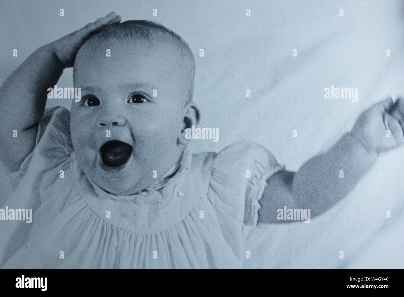 1970s baby girl in white hi-res stock photography and images - Alamy