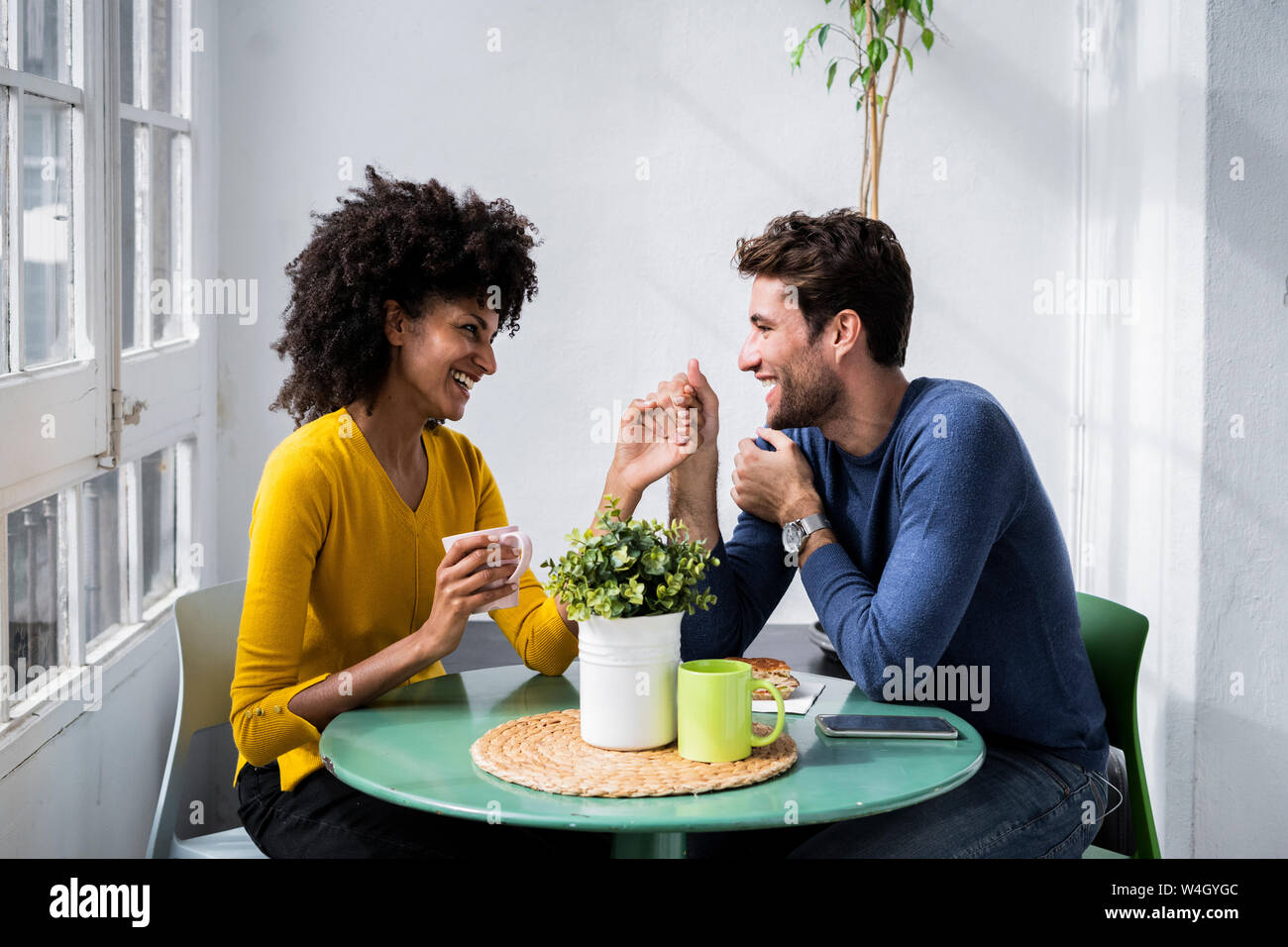 Couple flirting table hi-res stock photography and images - Alamy