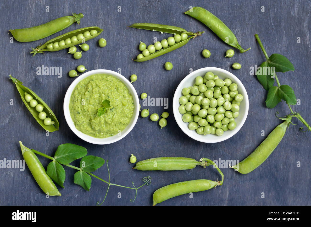Fresh green peas and green pea puree, top view Stock Photo - Alamy