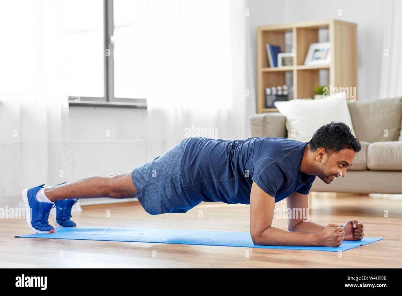 Man home plank hi-res stock photography and images - Alamy