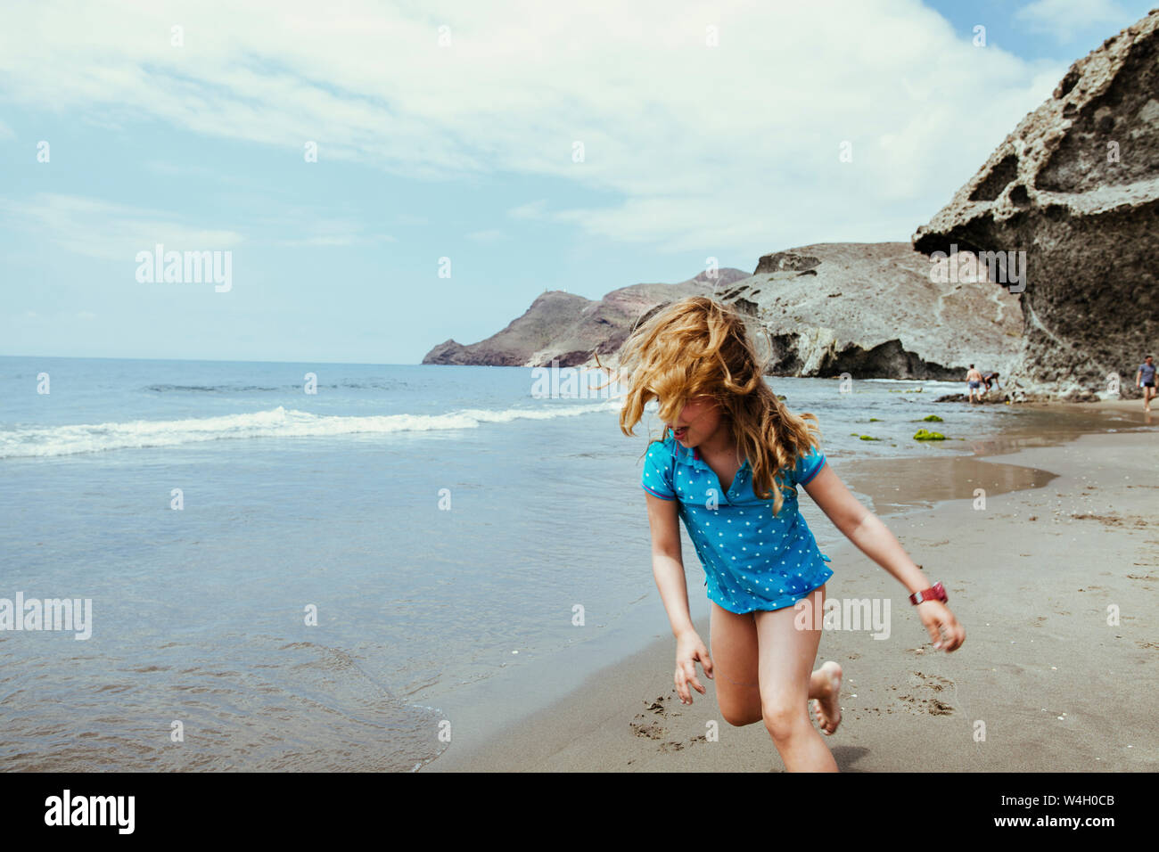 Girl playing seafront hi-res stock photography and images - Alamy