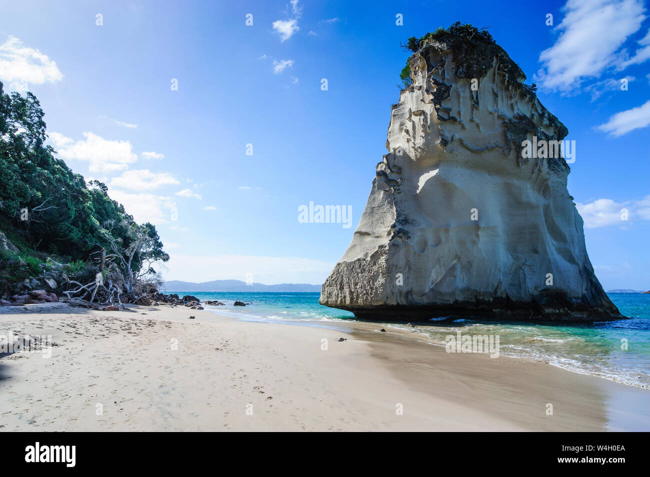 Giant rock on the sandy beach of Cathedral Cove, Coromandel, North ...
