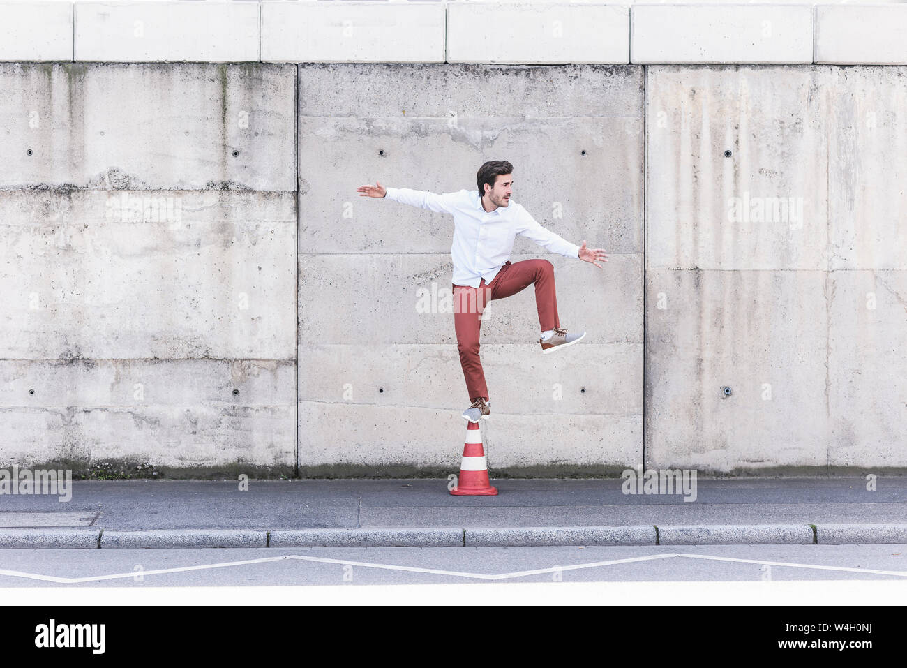 Traffic cone and man hi-res stock photography and images - Alamy