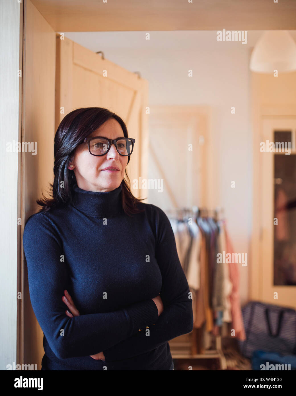 Portrait of mature woman at home Stock Photo - Alamy