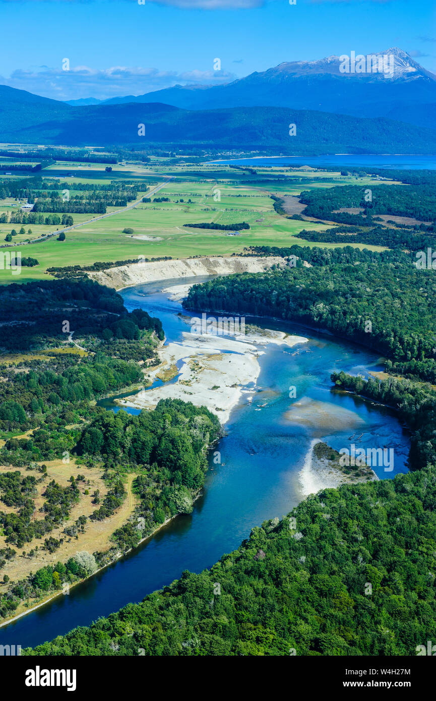 Aerial view of a river winding through Fiordland National Park, South ...