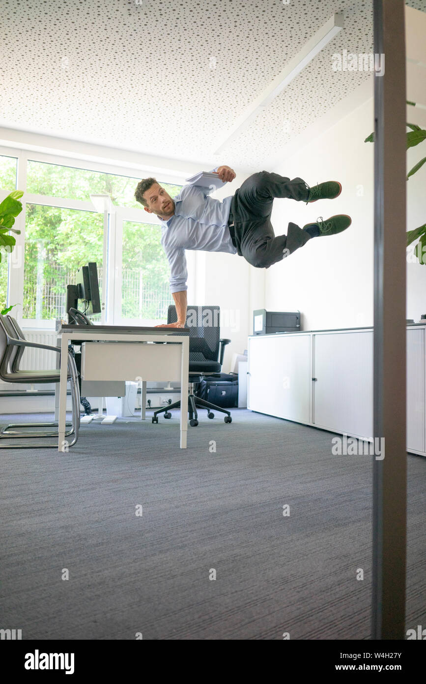 One handed hi-res stock photography and images - Alamy