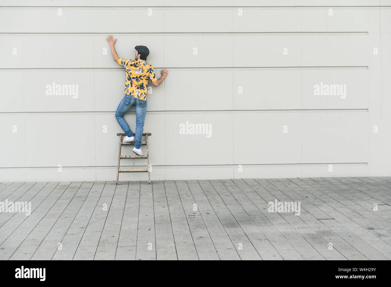 Man climbing step ladder hi-res stock photography and images - Alamy