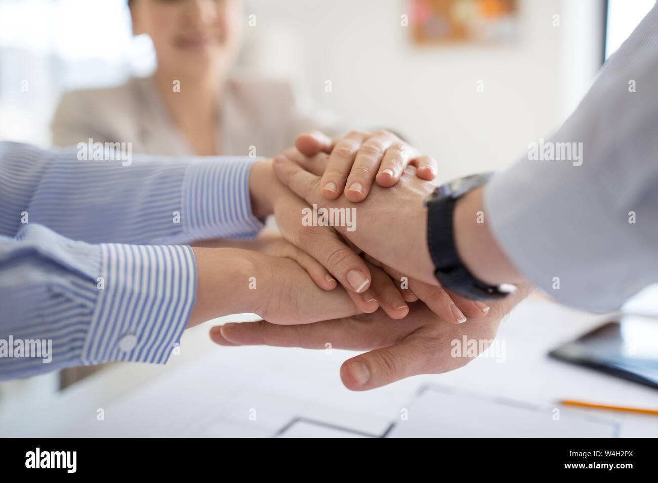 close up of business team stacking hands Stock Photo - Alamy