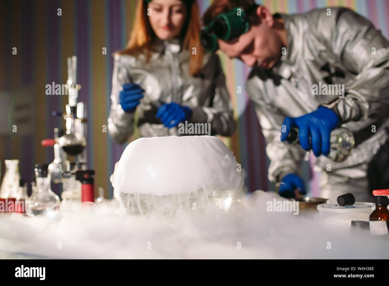 Experiments in a chemistry lab. conducting an experiment in the ...