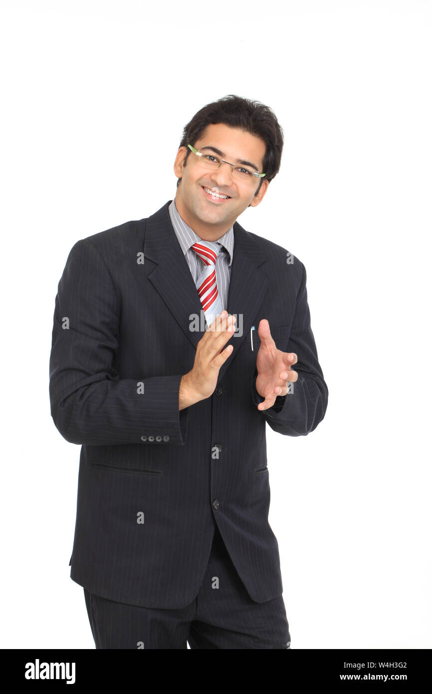 Happy young man clapping encouraging hi-res stock photography and ...