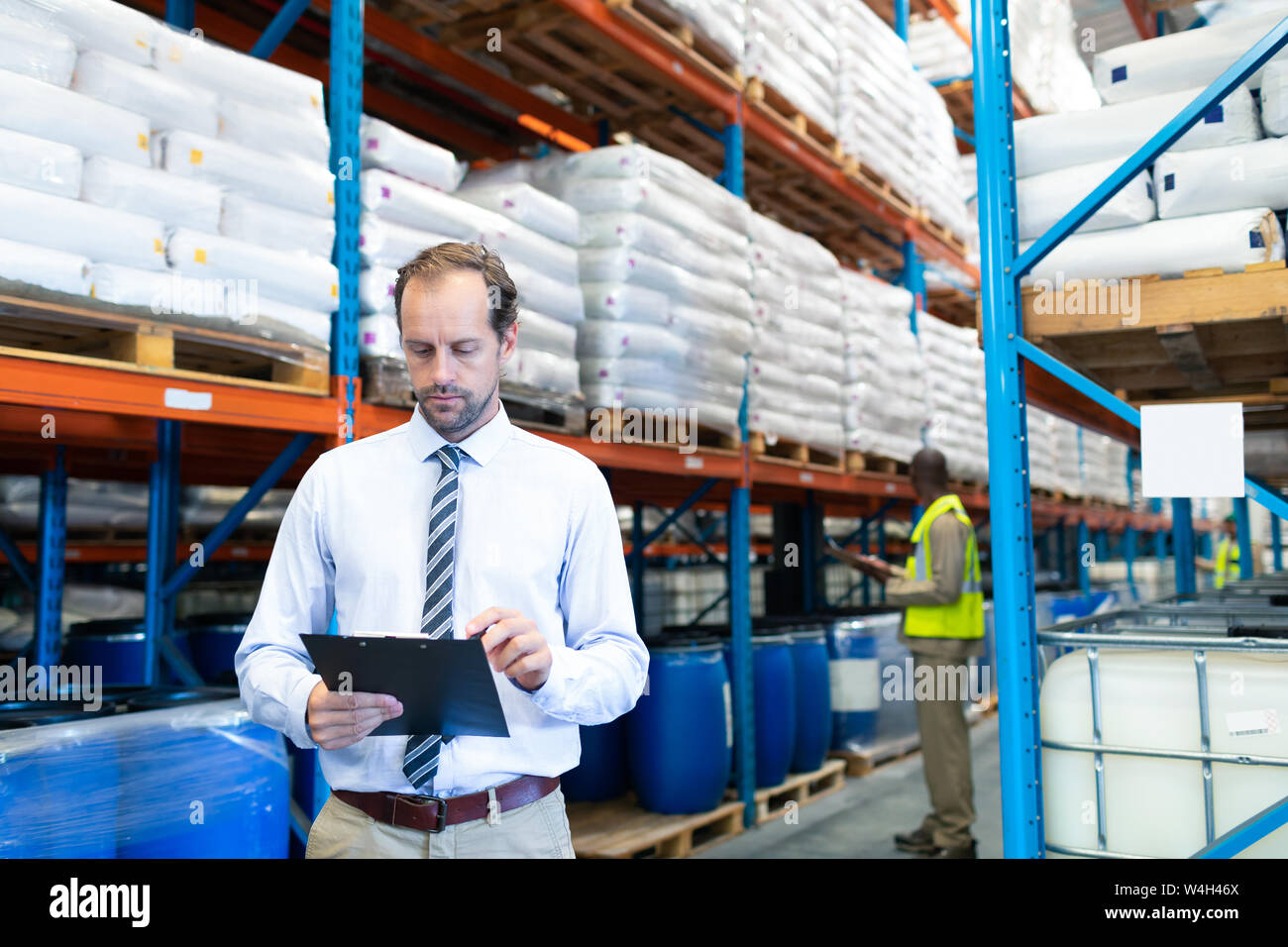 Supervisor checking hi-res stock photography and images - Alamy