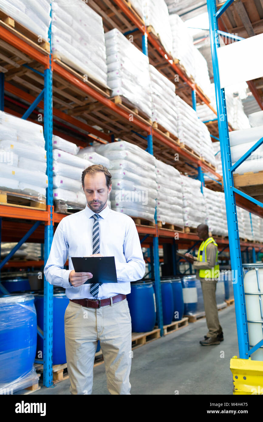 Male supervisor checking stocks hi-res stock photography and images - Alamy