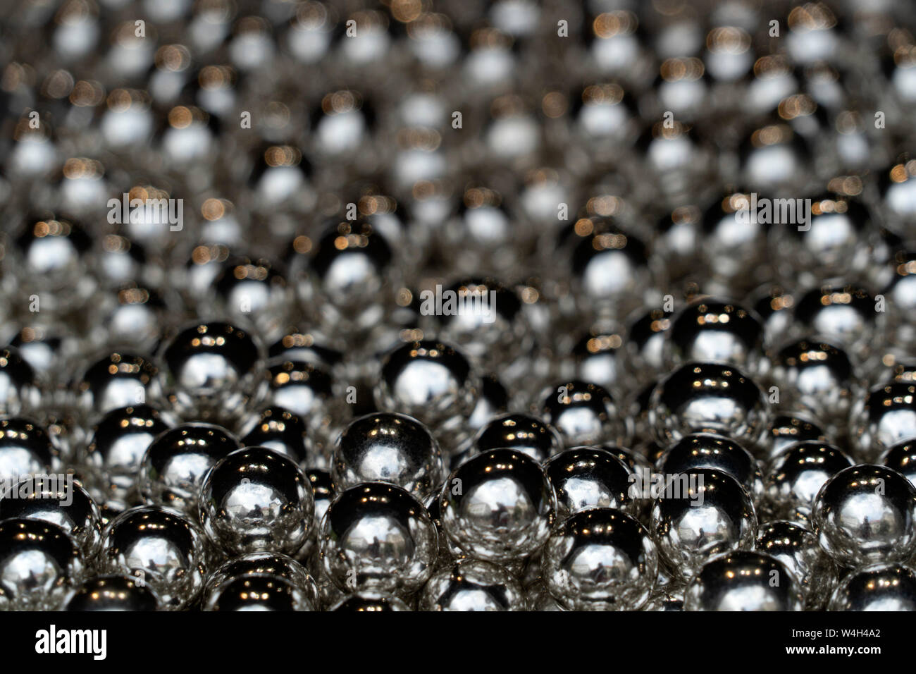 silver balls spheres many of in a shop Stock Photo - Alamy