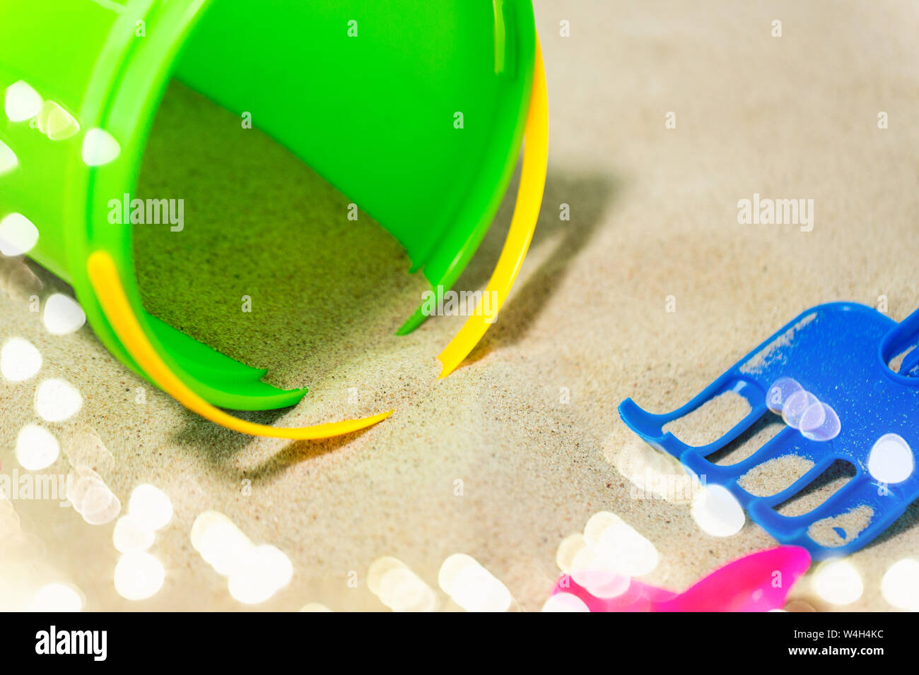 Toy sand rake hi-res stock photography and images - Alamy