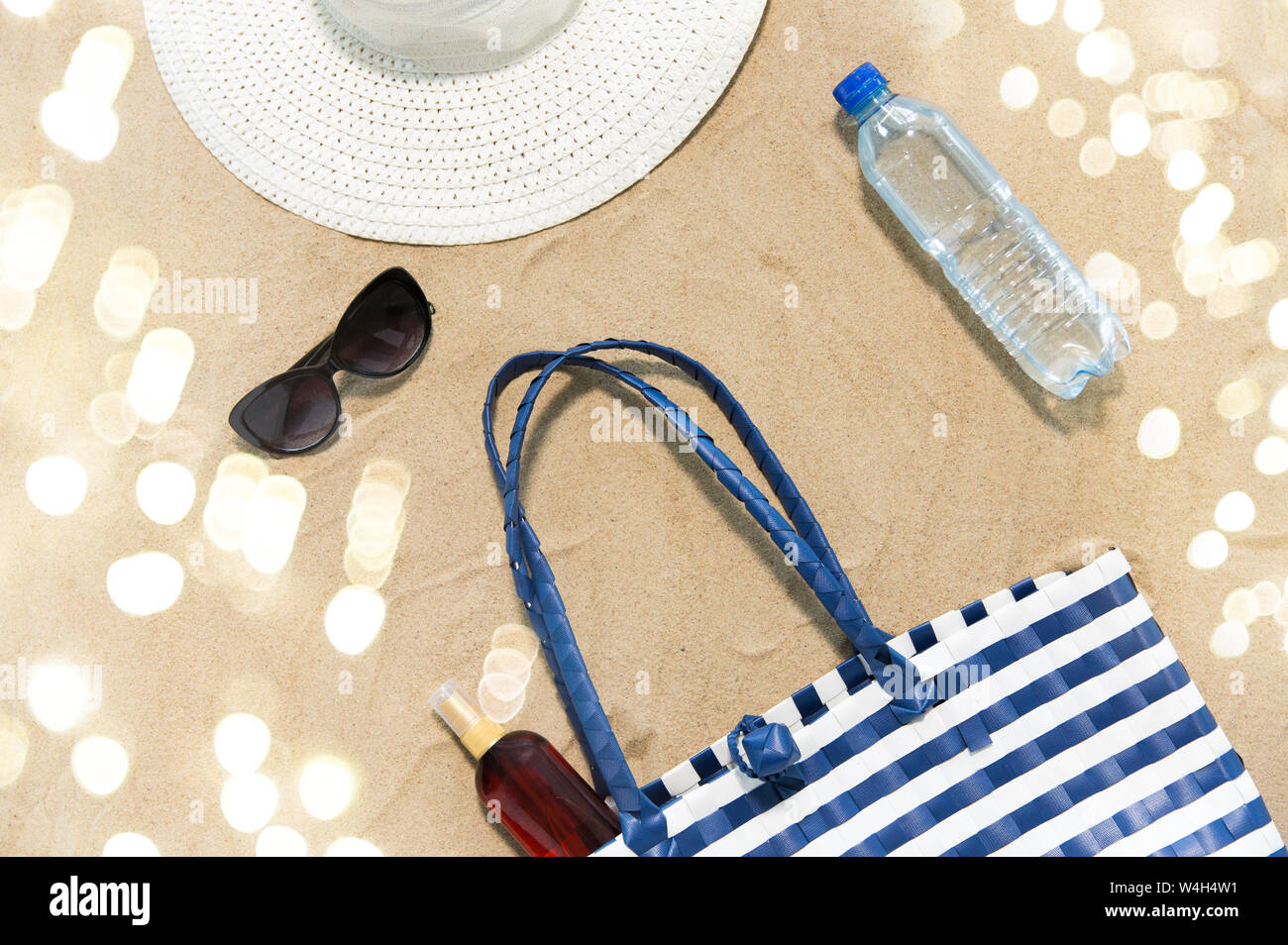 Striped bag bottle sunscreen hi-res stock photography and images - Alamy