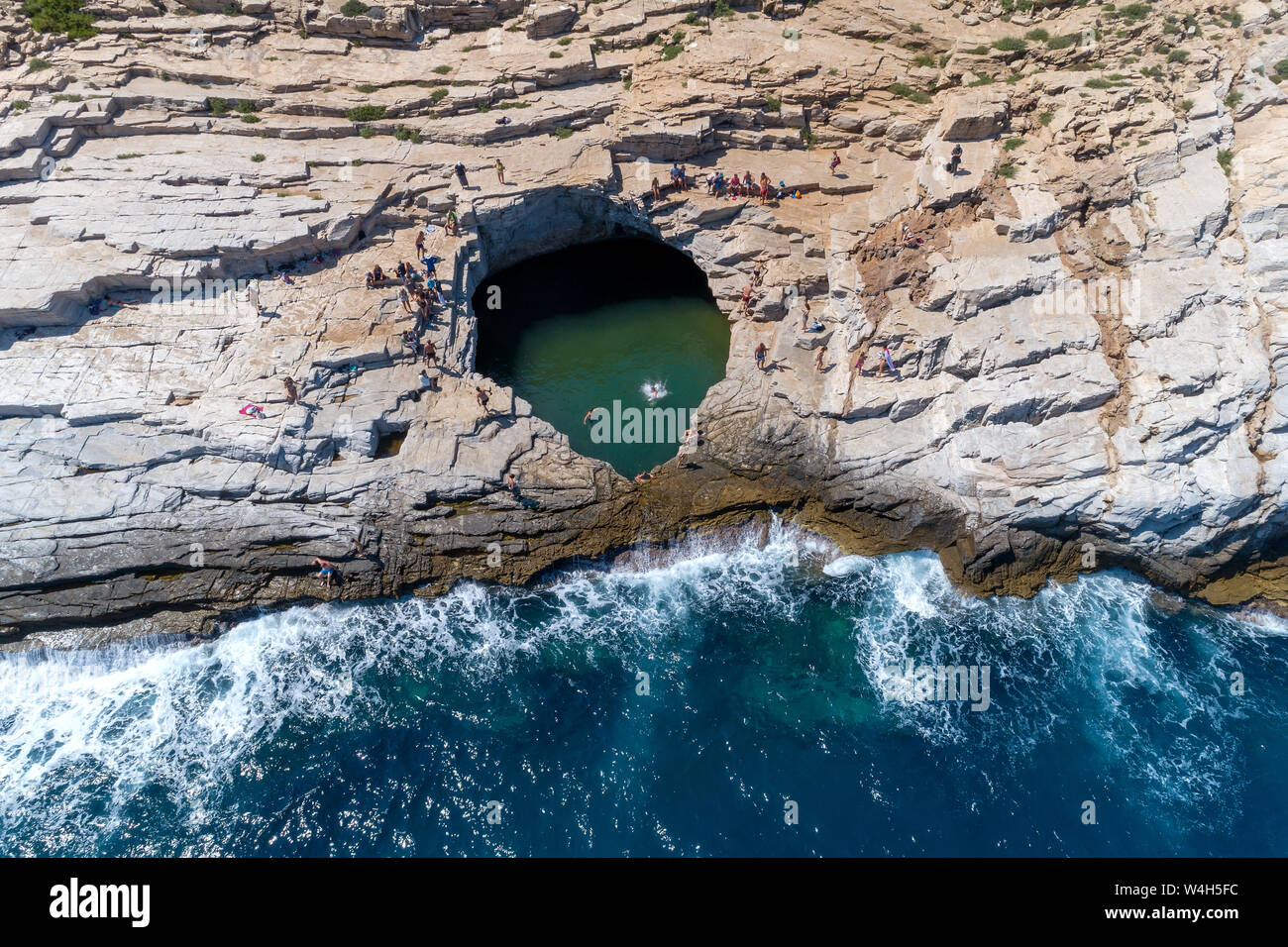 Aerial view of Tourists bathing in the Giola. Giola is a natural pool ...