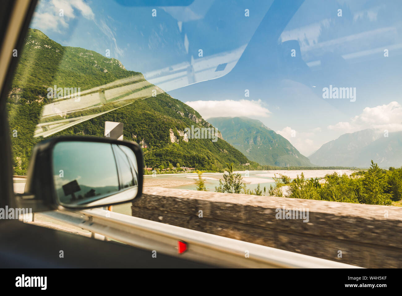 view from car window of mountains with river background road trip Stock ...