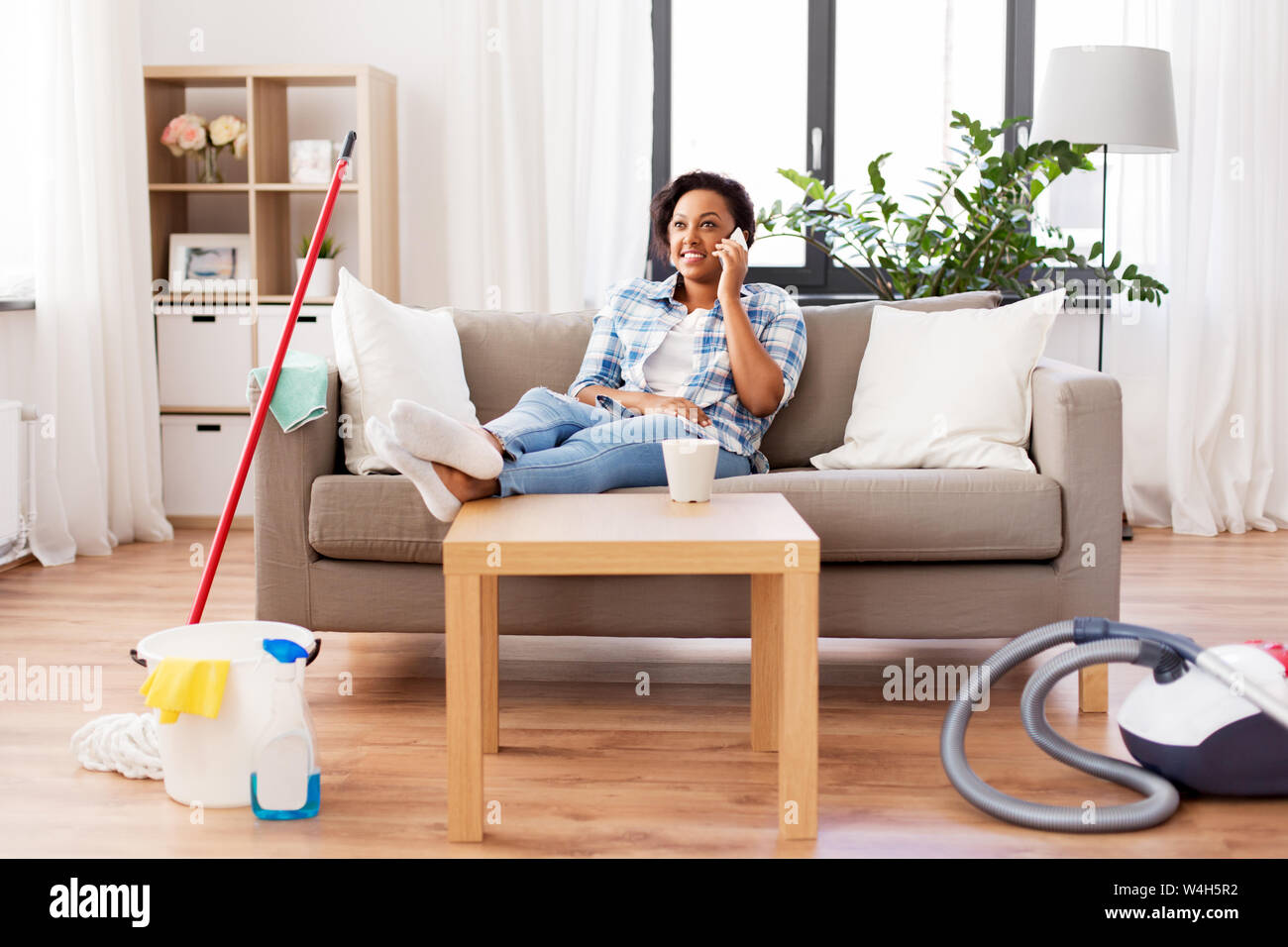 Female house cleaning talking hi-res stock photography and images - Alamy
