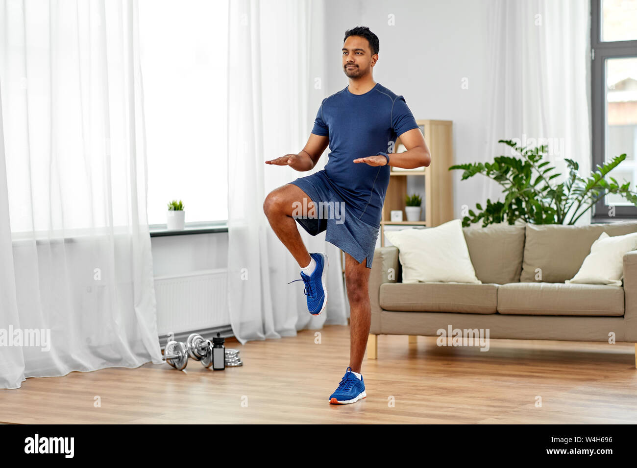 indian man running on spot at home Stock Photo - Alamy