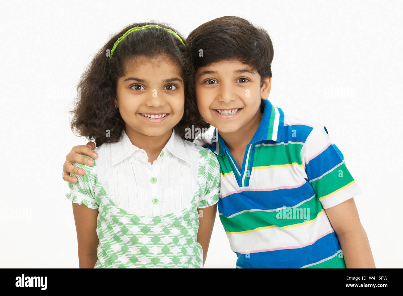 Portrait of two Indian children smiling Stock Photo - Alamy