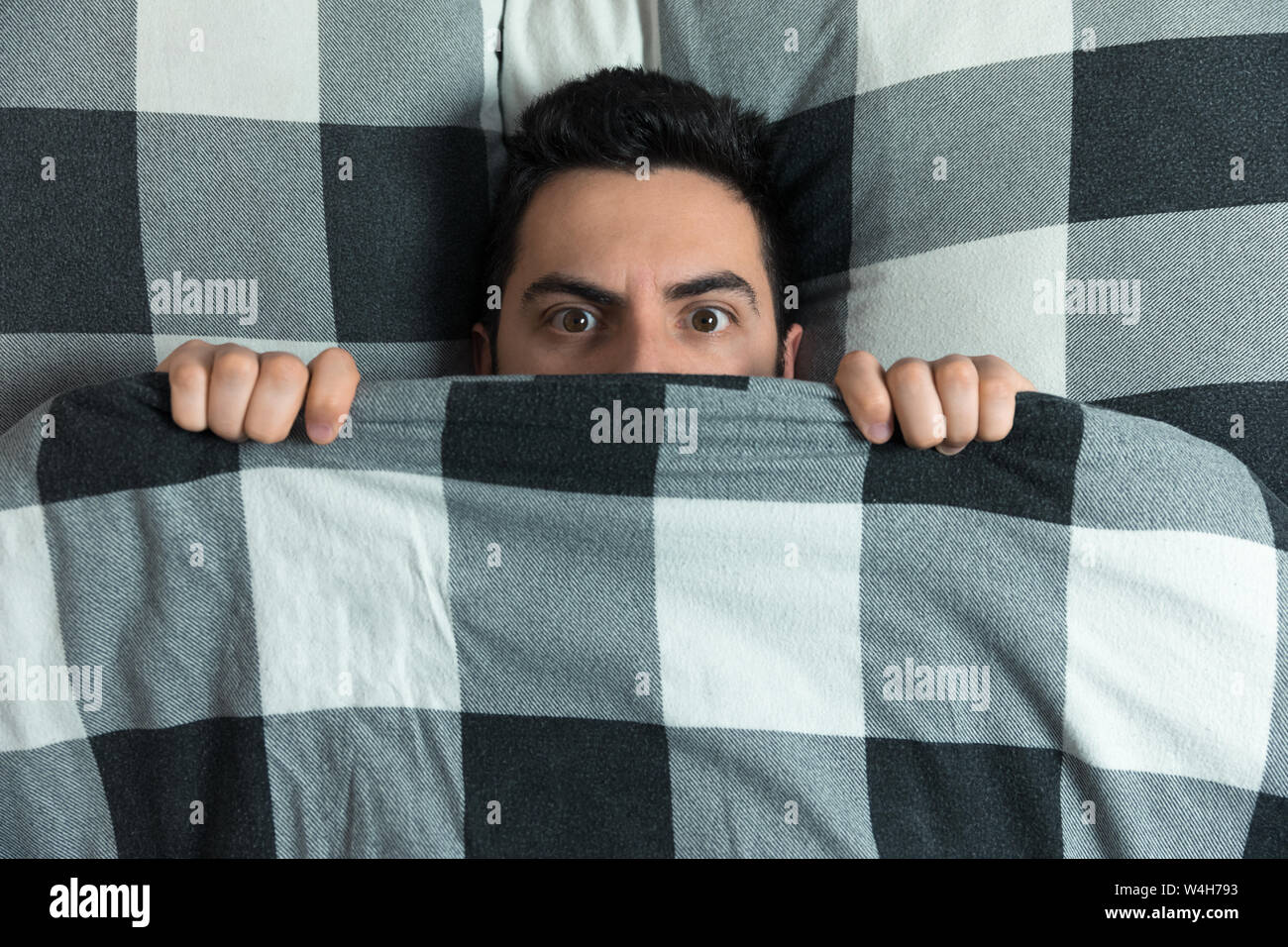 Under sheet man hide hi-res stock photography and images - Alamy