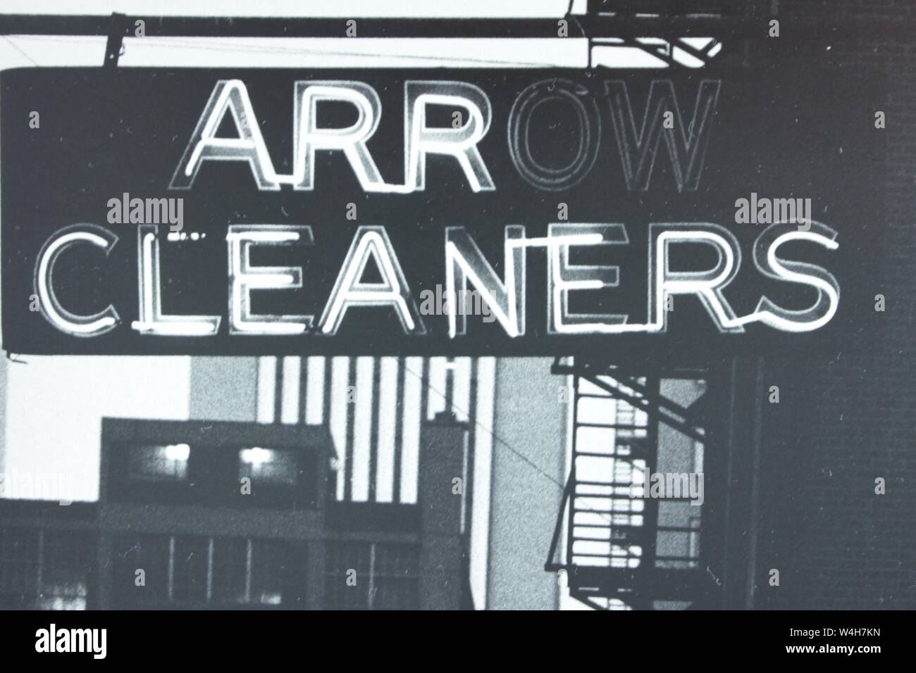 Fine black and white art photography from the 1970s of a neon sign of ...