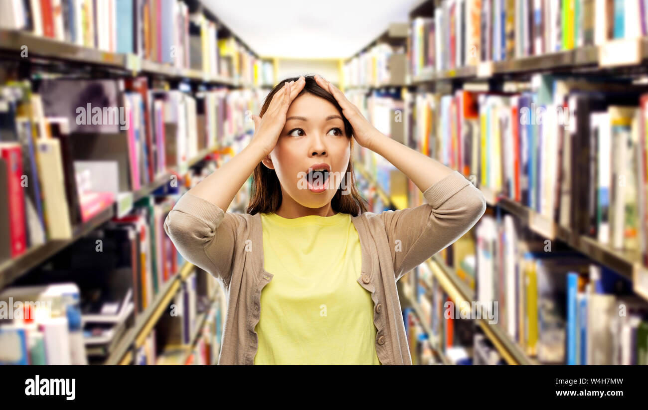Stressed student reading book hi-res stock photography and images - Alamy