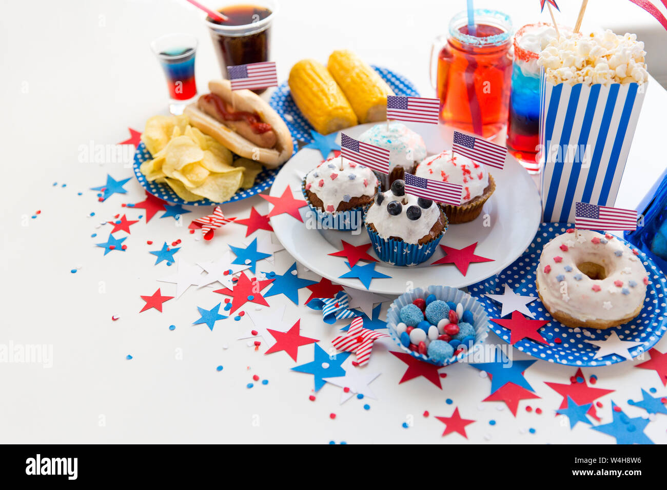 food and drinks on american independence day party Stock Photo - Alamy