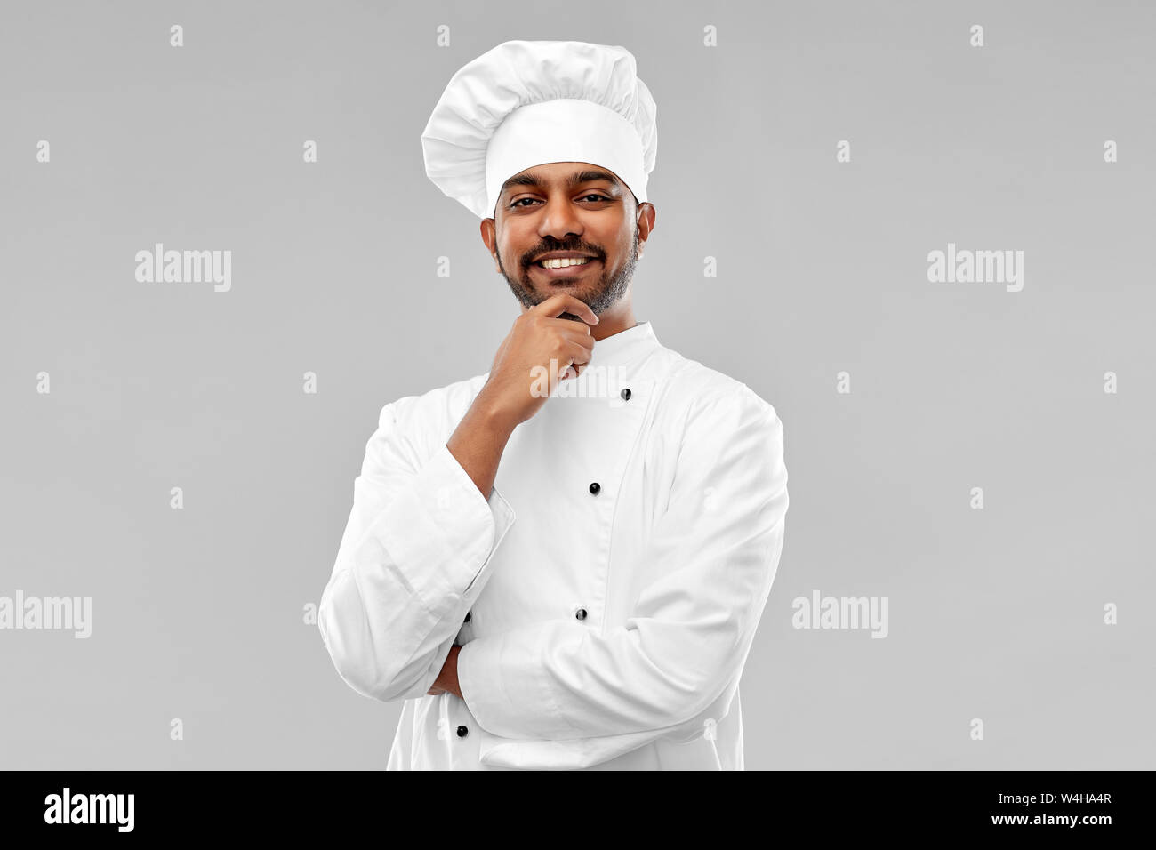 happy male indian chef in toque Stock Photo - Alamy
