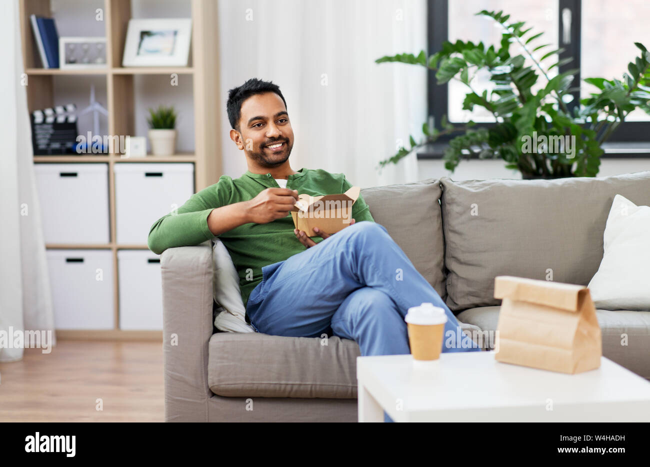 Indian man eating hi-res stock photography and images - Alamy