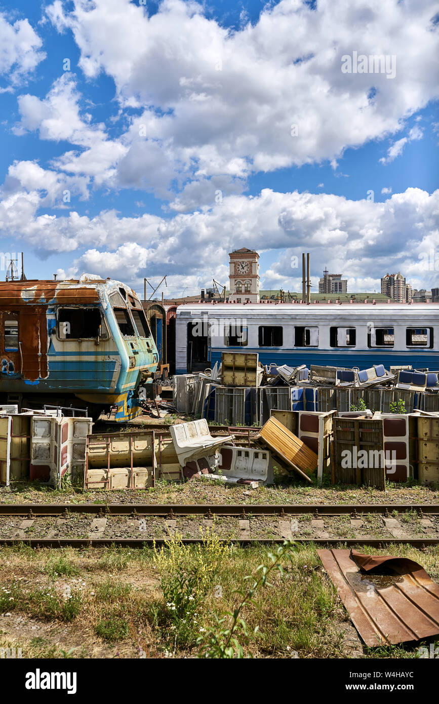 Railroad depot with abandoned trains and wagons Stock Photo - Alamy