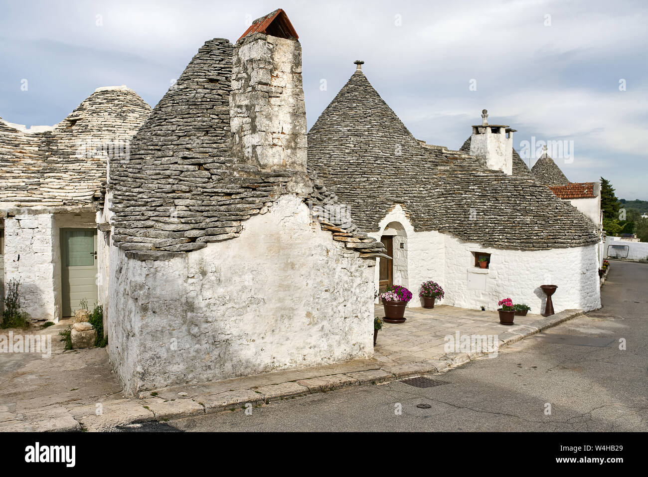 Old trulli houses in Alberobello town in Italy Stock Photo - Alamy