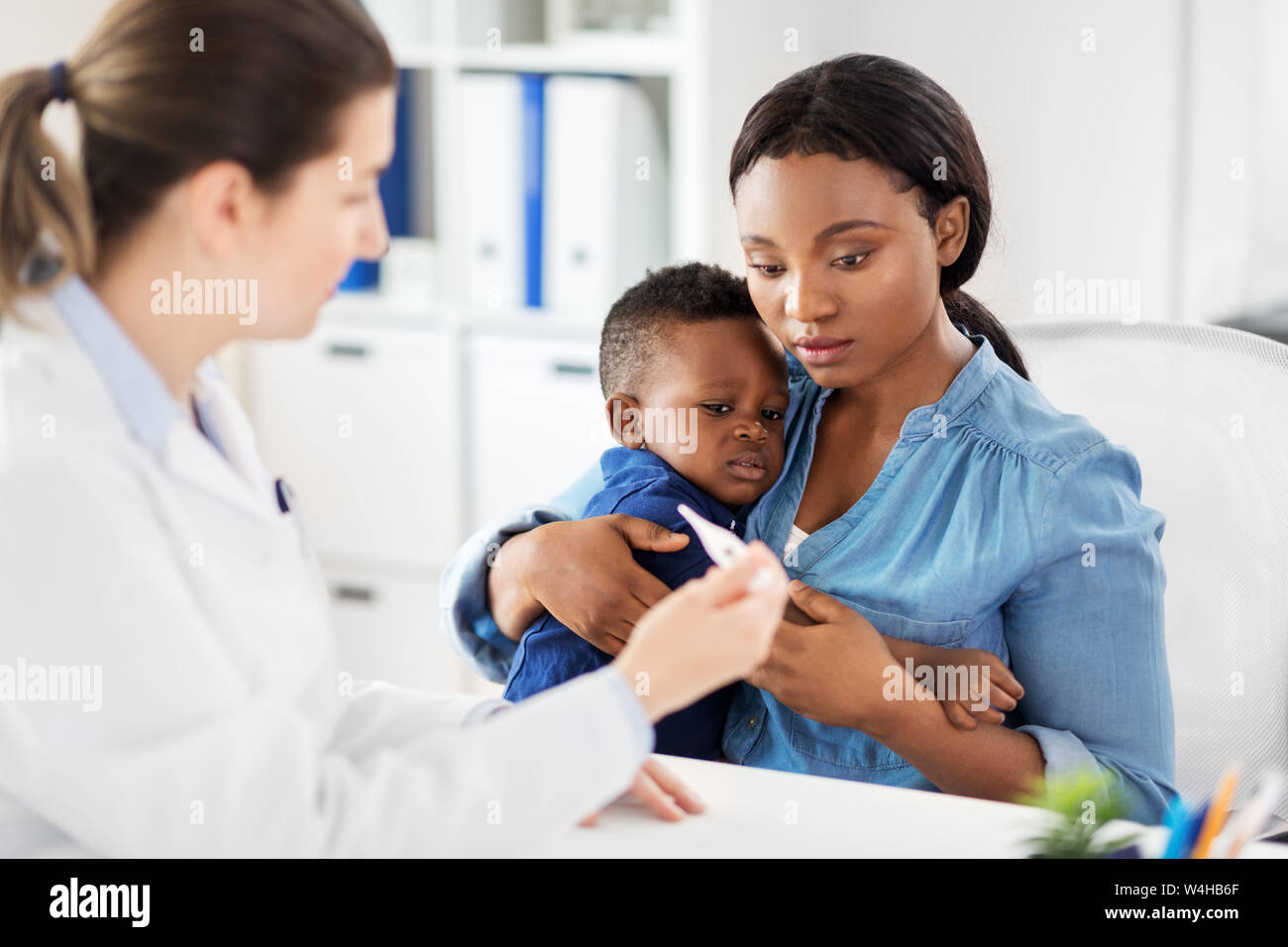 Doctor With Sick Child