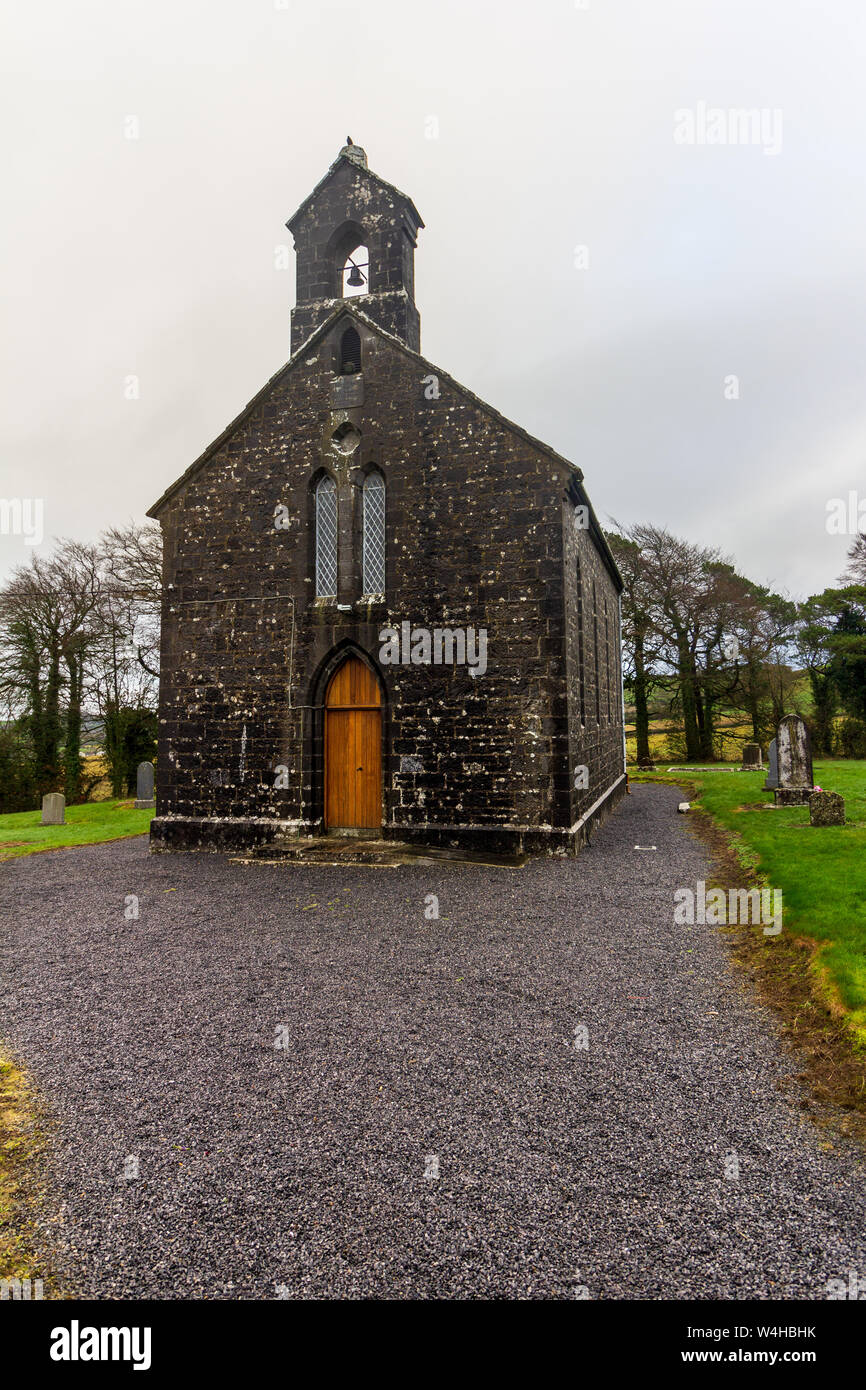 The Holy Trinity Church is located below the Rock of Dunamase in County ...