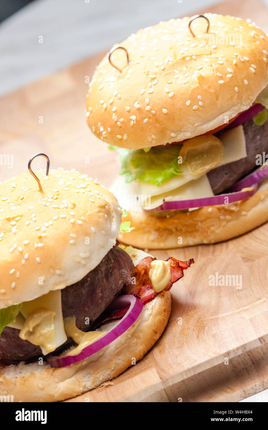 still life of beef burger with cheese Stock Photo - Alamy