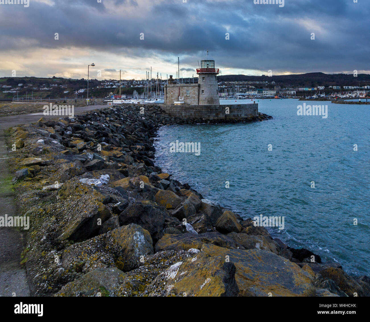 Howth Lighthouse is located at the entrance to the harbor in Howth ...