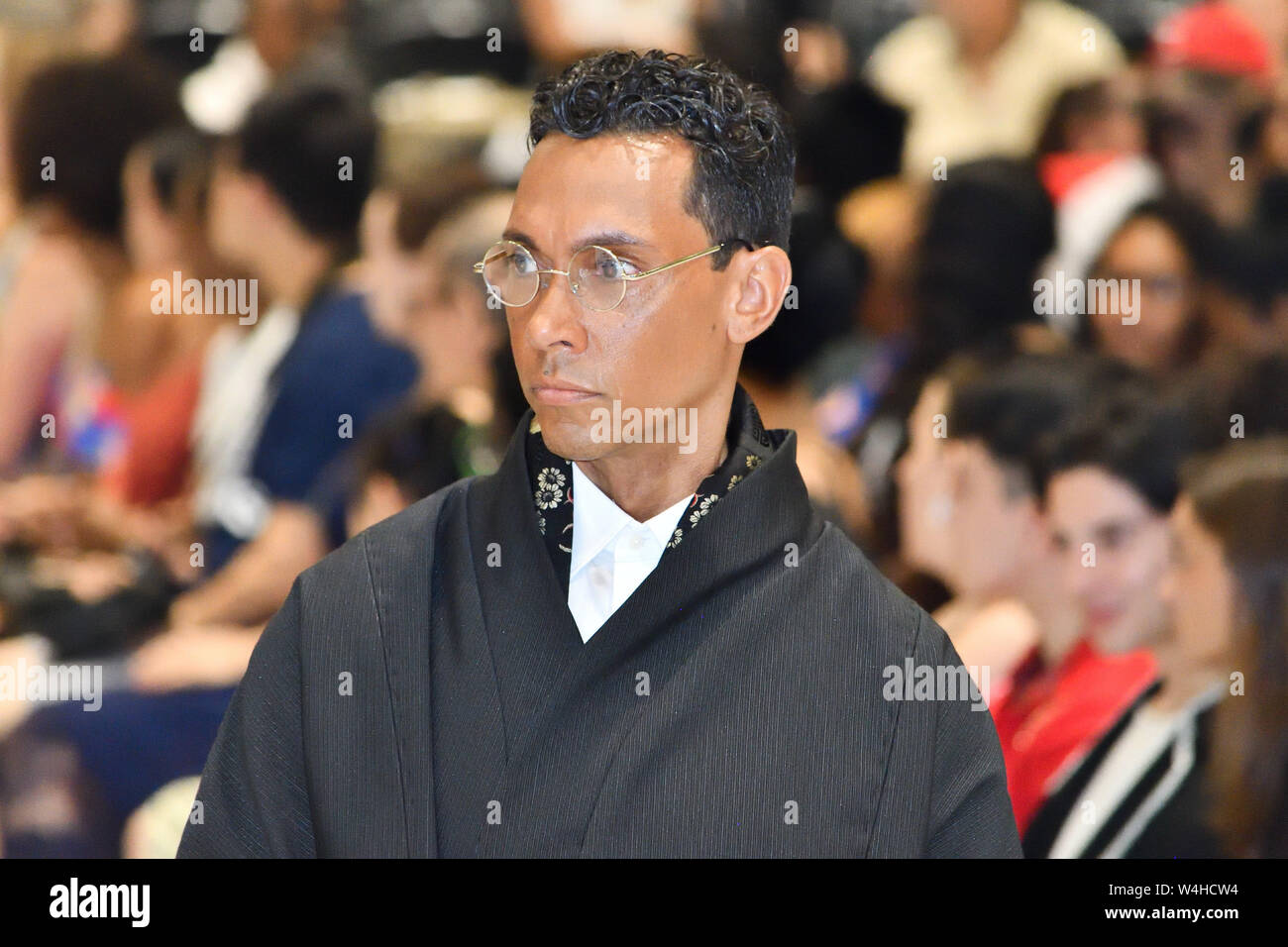 Marcus Seda walks the Runway at Fashion on the Hudson show at Riverbank ...