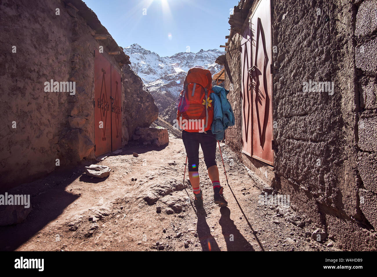 Tourist girl backpacker on the hike into the Atlas mountains in Morocco ...