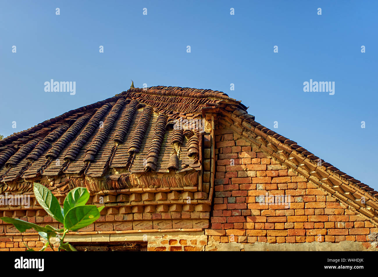 01-Sep-2008-clay roof tiles & brickwall farmers village house near ...