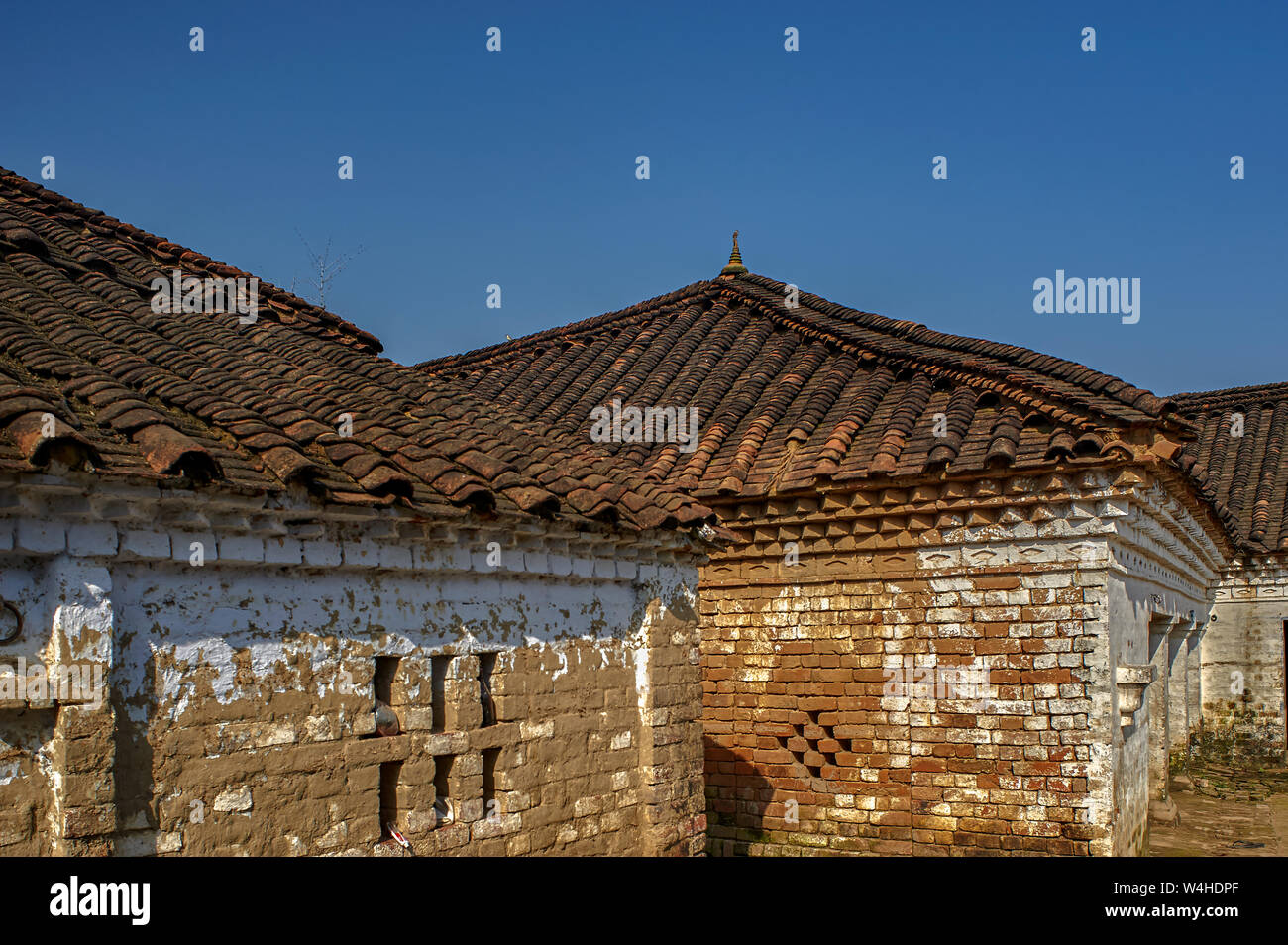 01-Sep-2008-clay roof tiles & brickwall farmers village house near ...